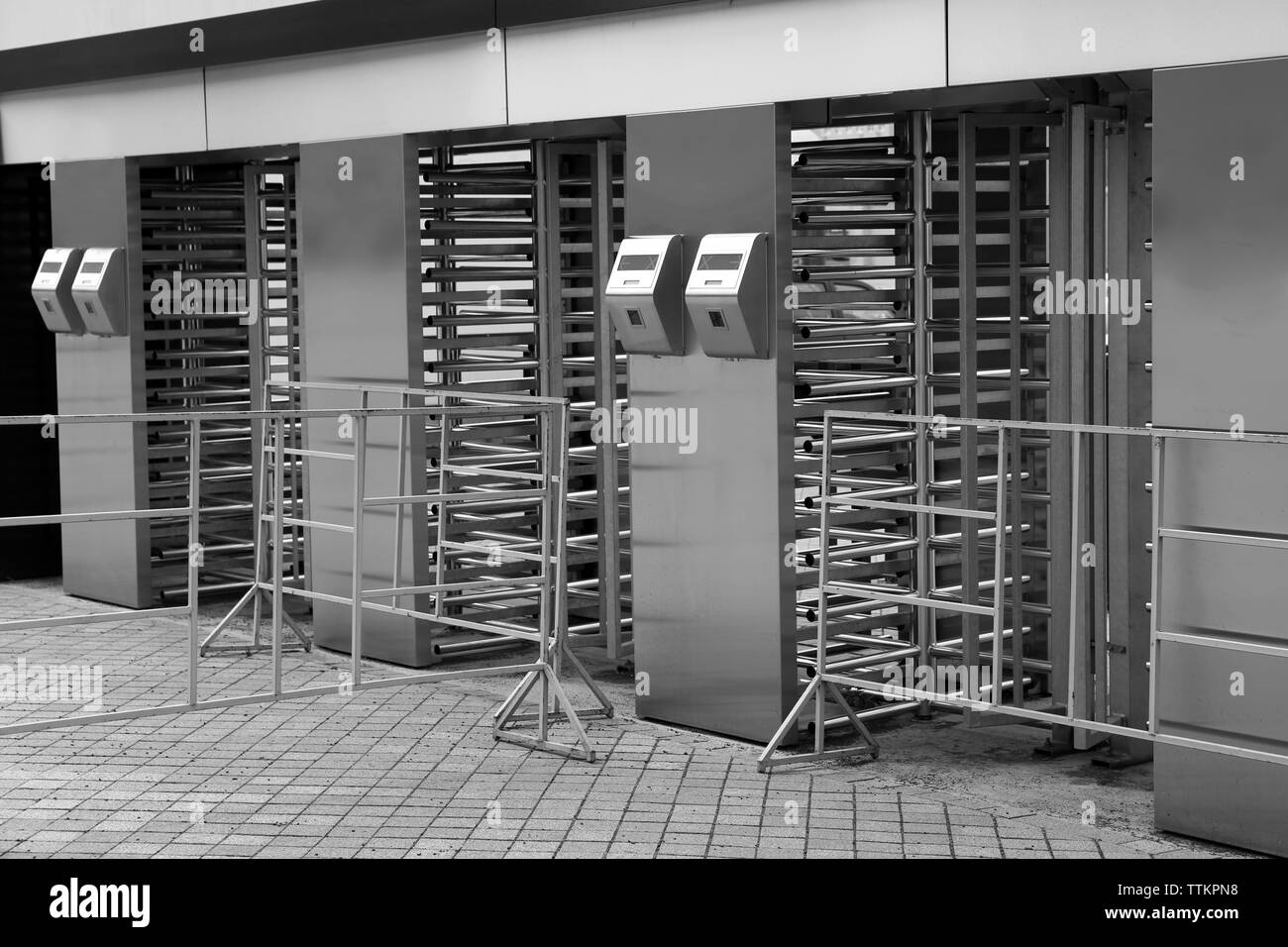Turnstile entrance to stadium Stock Photo - Alamy