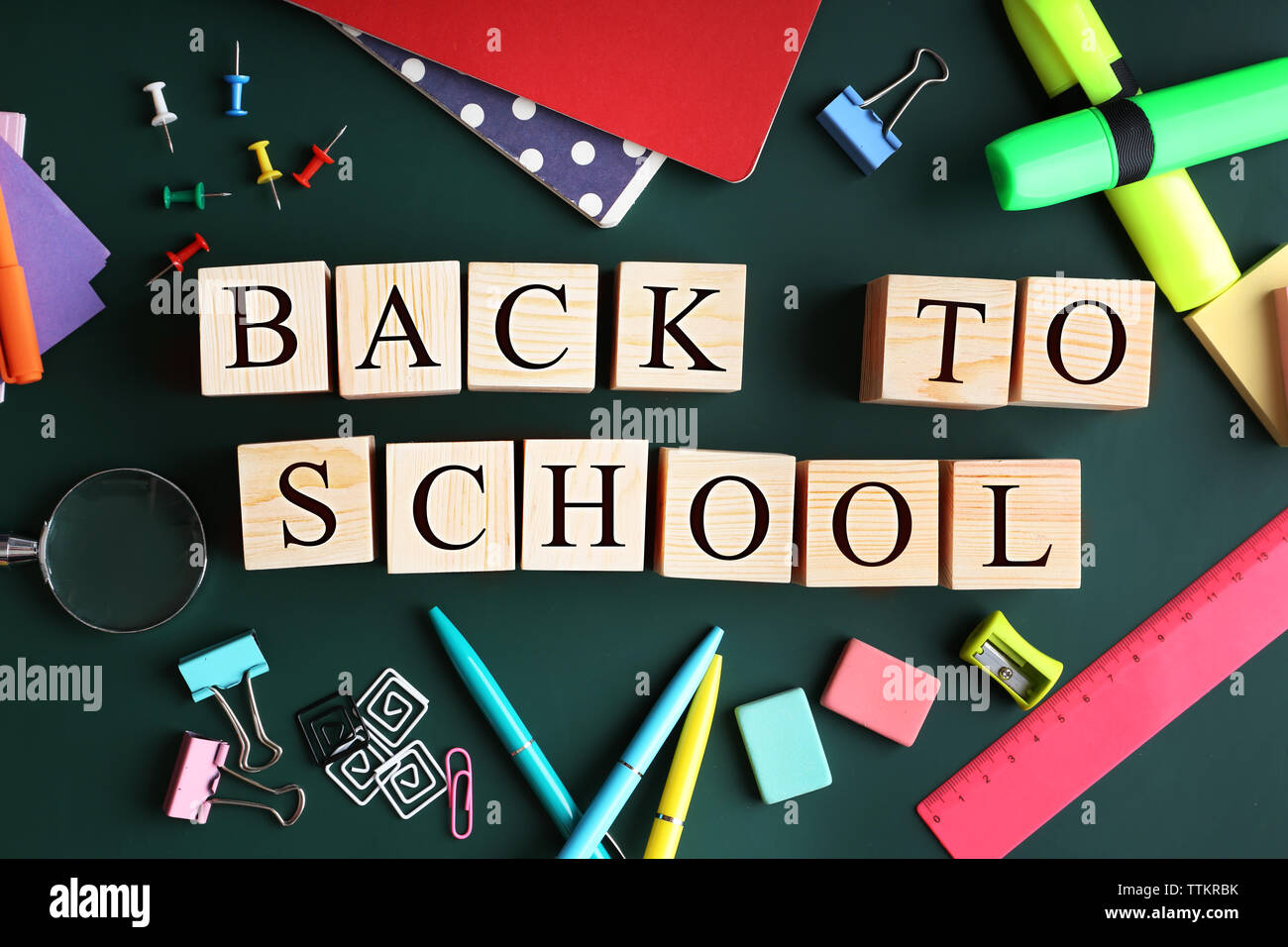 Colourful stationery and words BACK TO SCHOOL on chalkboard Stock Photo ...