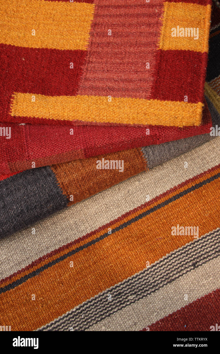 Rugs at a market stall, Dilli Haat, New Delhi, India Stock Photo - Alamy