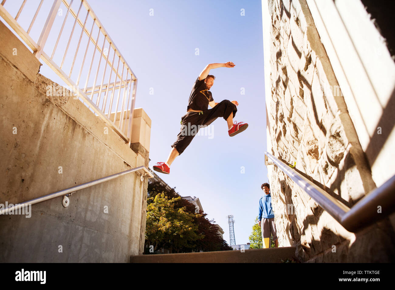 Jumping low angle hi-res stock photography and images - Alamy
