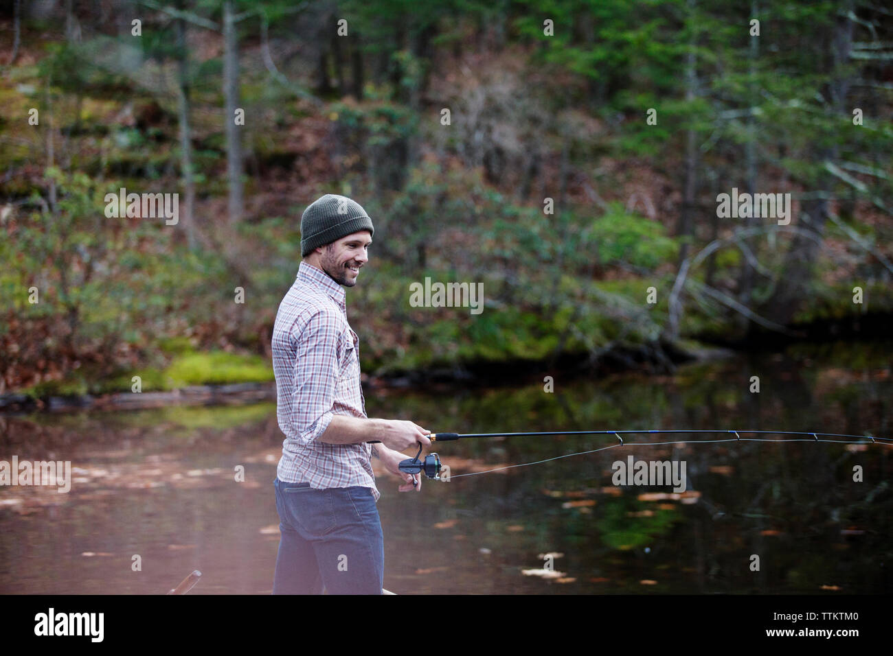 Man fishing in lake hi-res stock photography and images - Alamy