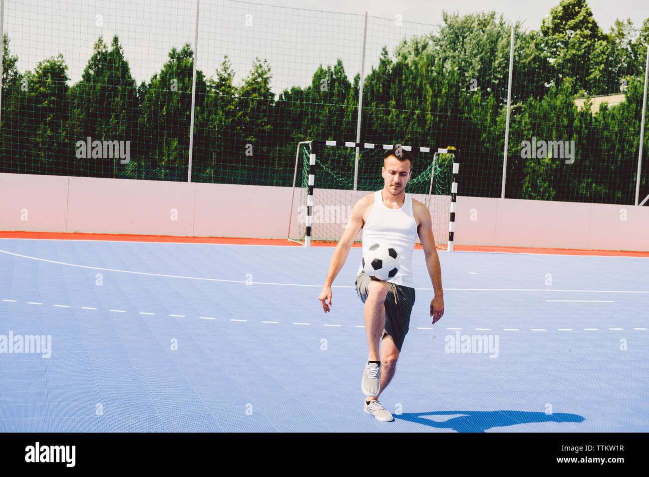 Man bouncing ball hi-res stock photography and images - Alamy