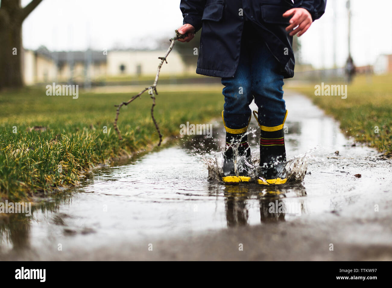 Puddle jumping hi-res stock photography and images - Alamy