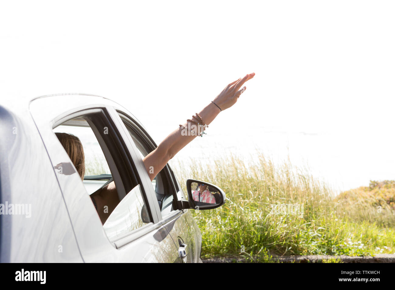 Woman waving hand hi-res stock photography and images - Alamy