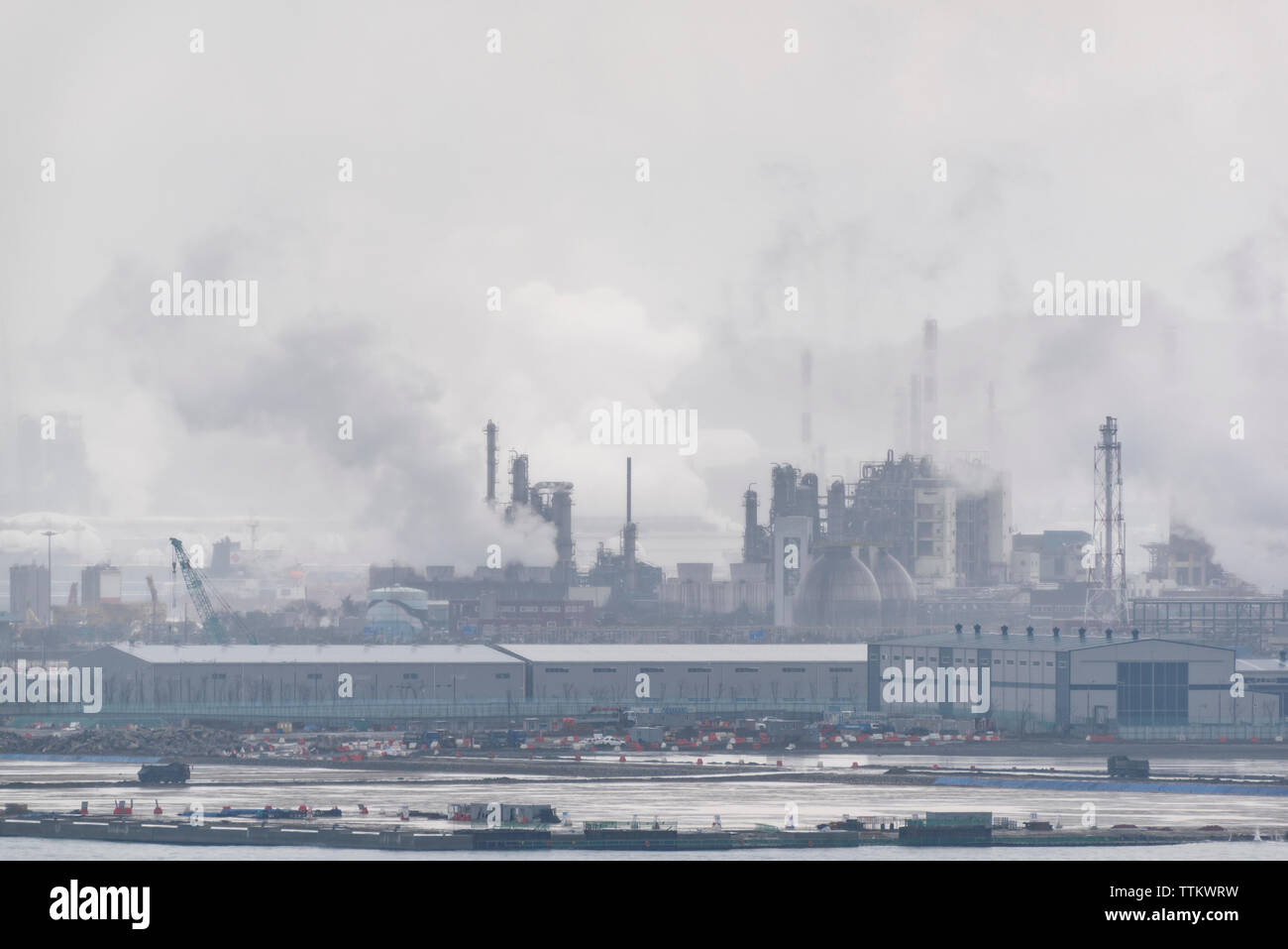 Industrial emissions from refinery in South Korea Stock Photo - Alamy