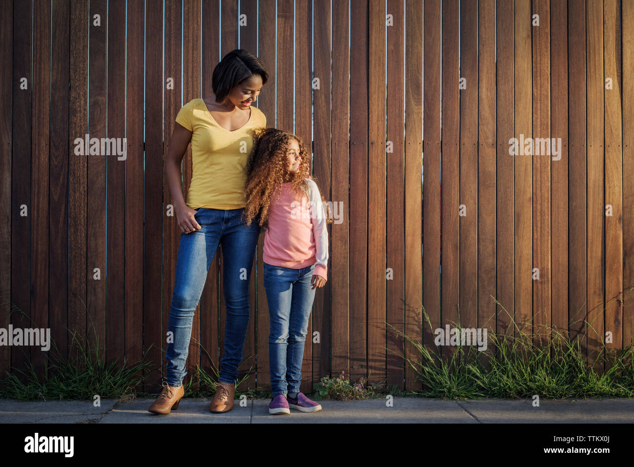 Daughter standing hi-res stock photography and images - Alamy