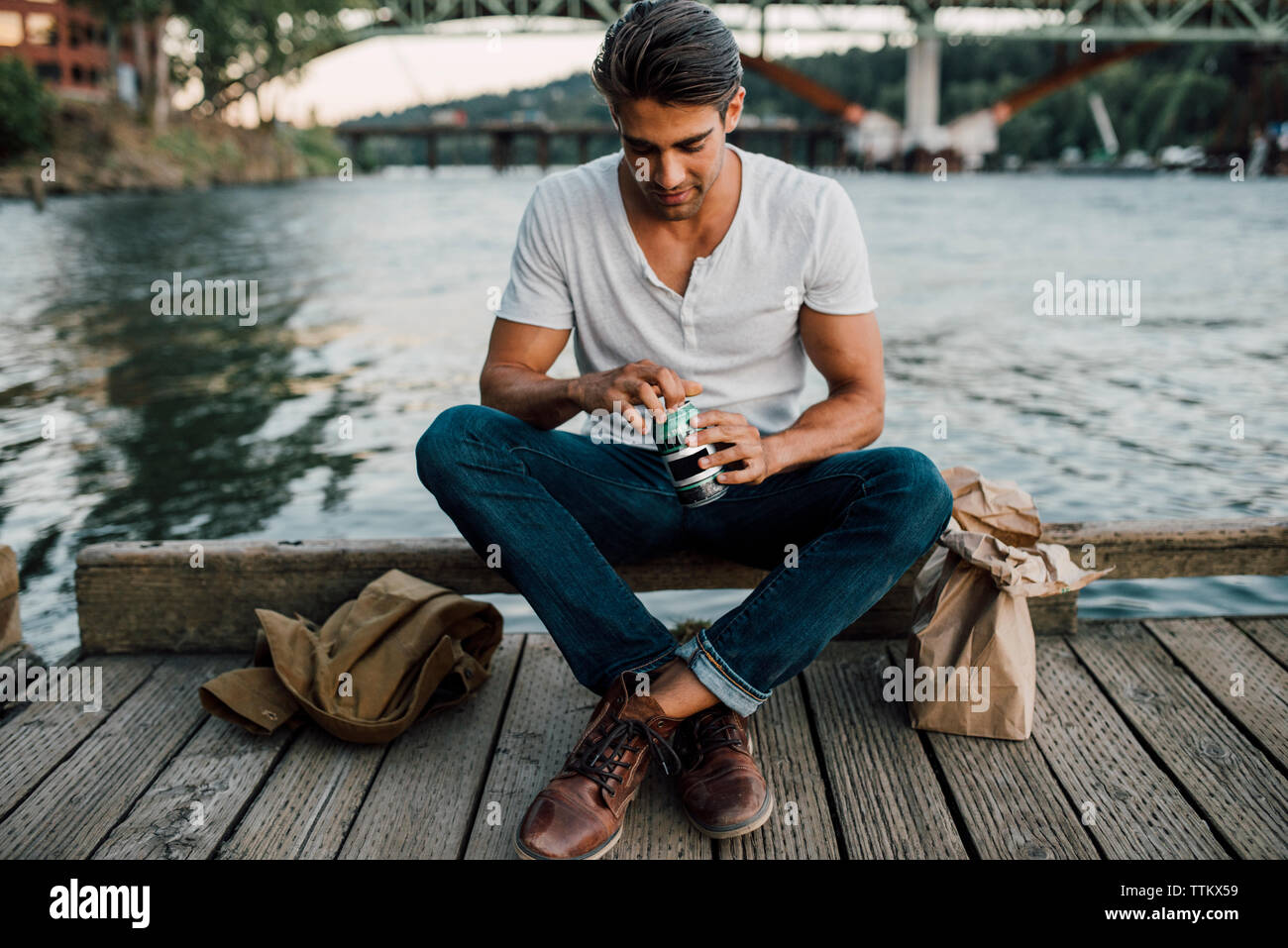 Man opening drink can hi-res stock photography and images - Alamy