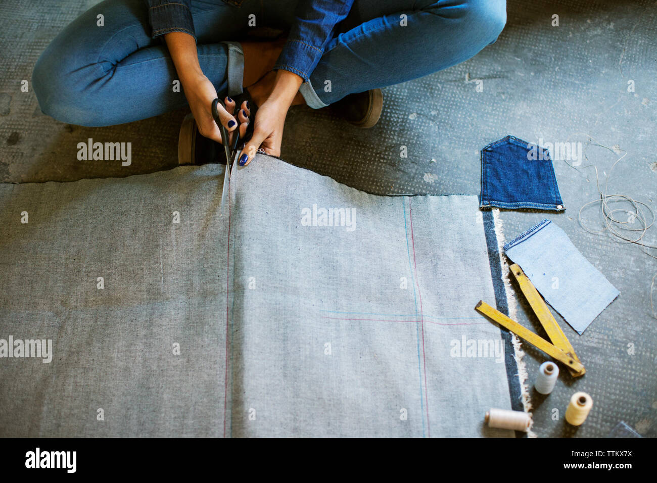 Cutting fabric hi-res stock photography and images - Alamy