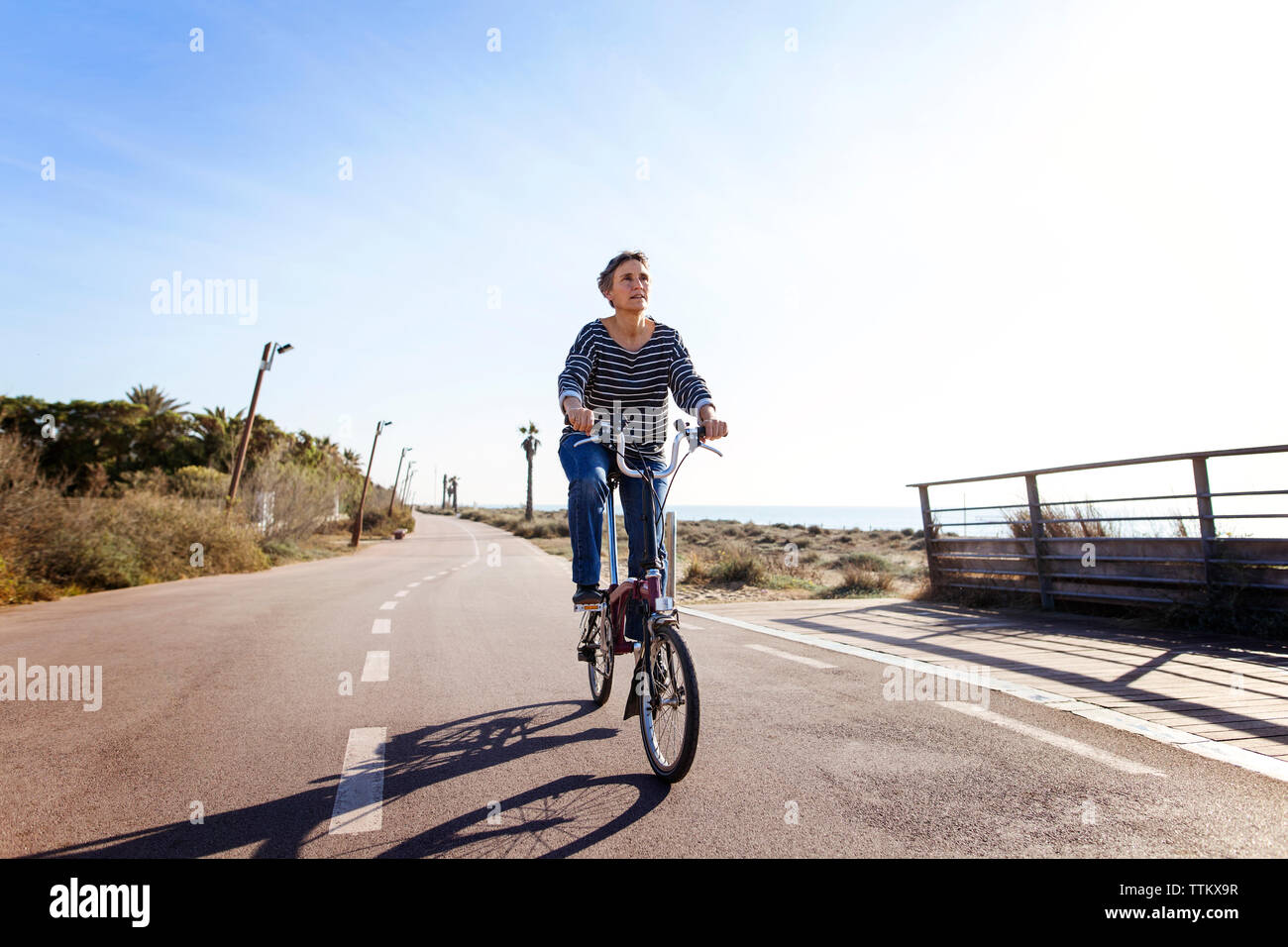 Woman on road against hi-res stock photography and images - Alamy
