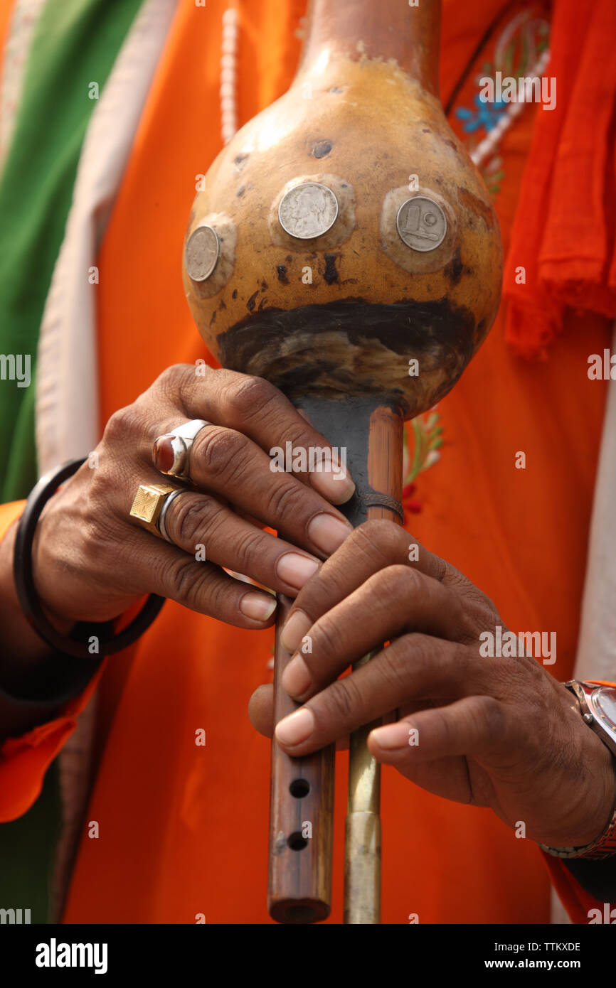 Snake charmer playing pungi, Dilli Haat, New Delhi, India Stock Photo ...