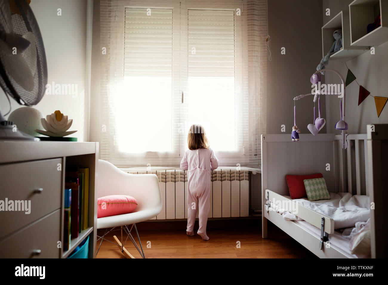 Girl Looking Inside A Room