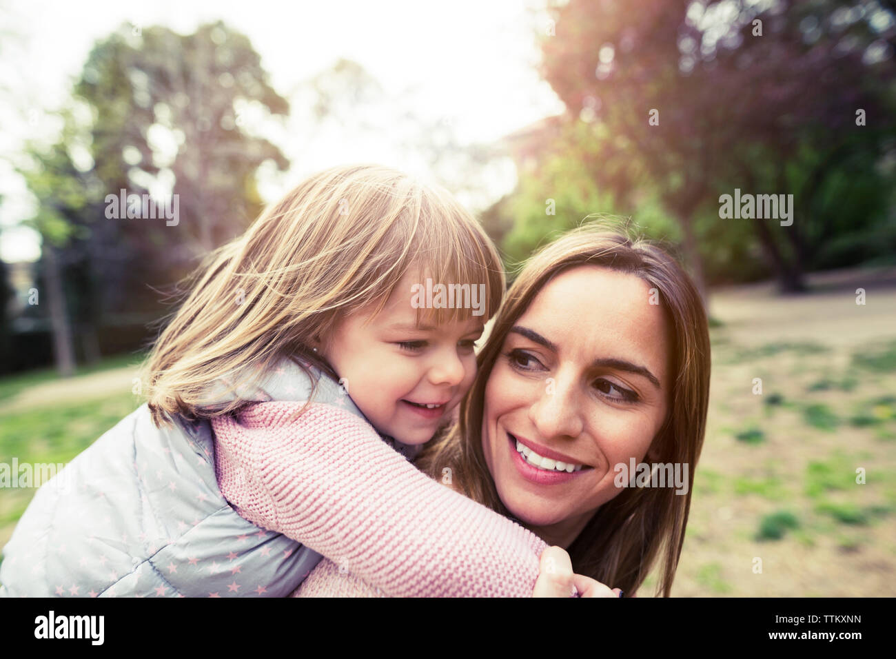 Child piggybacking hi-res stock photography and images - Alamy