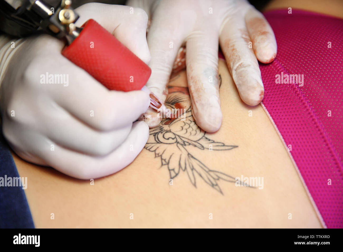 Process of making tattoo, closeup Stock Photo - Alamy