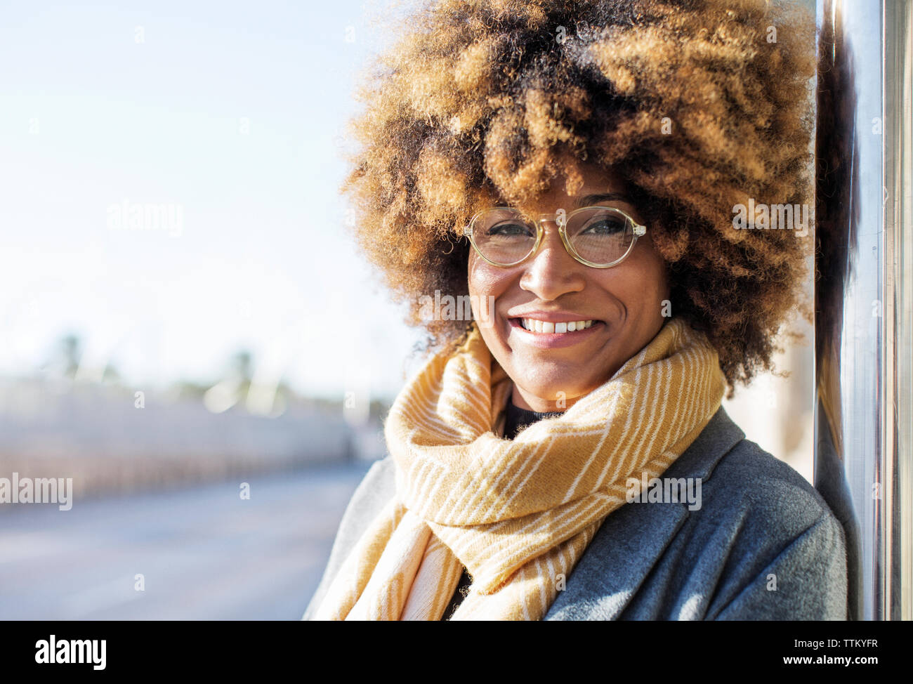 Woman standing bus stop hi-res stock photography and images - Alamy