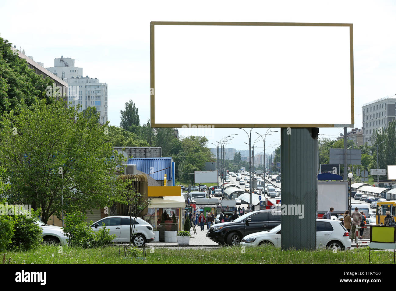 Billboard on city street Stock Photo - Alamy