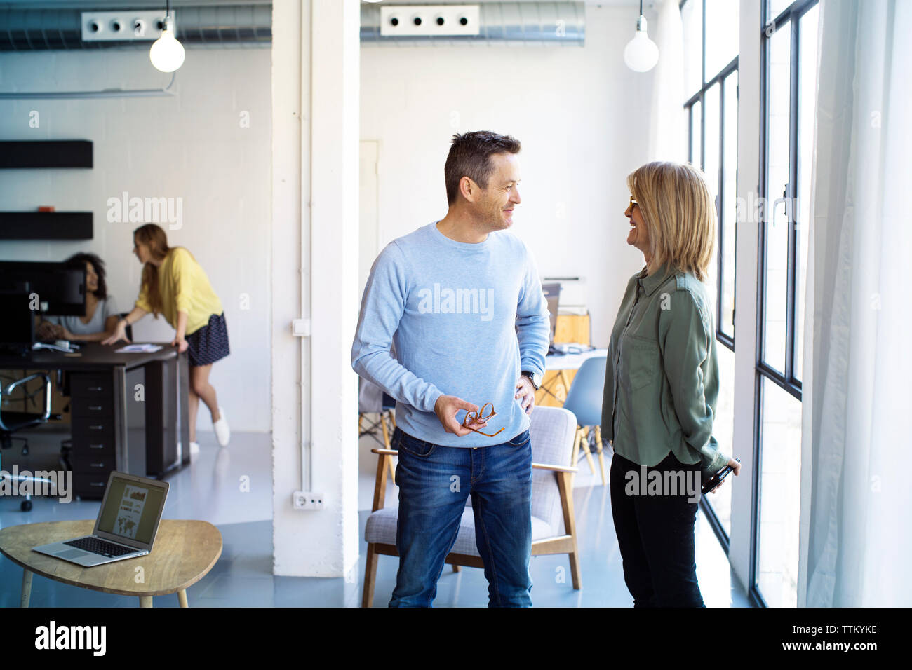 African colleagues talking sitting desktop hi-res stock photography and ...