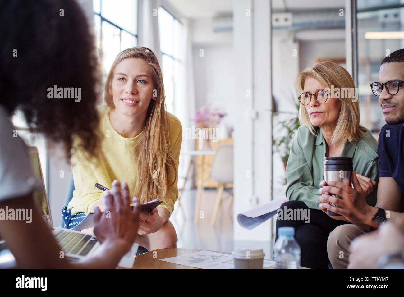 Colleagues discussing in meeting at board room Stock Photo - Alamy