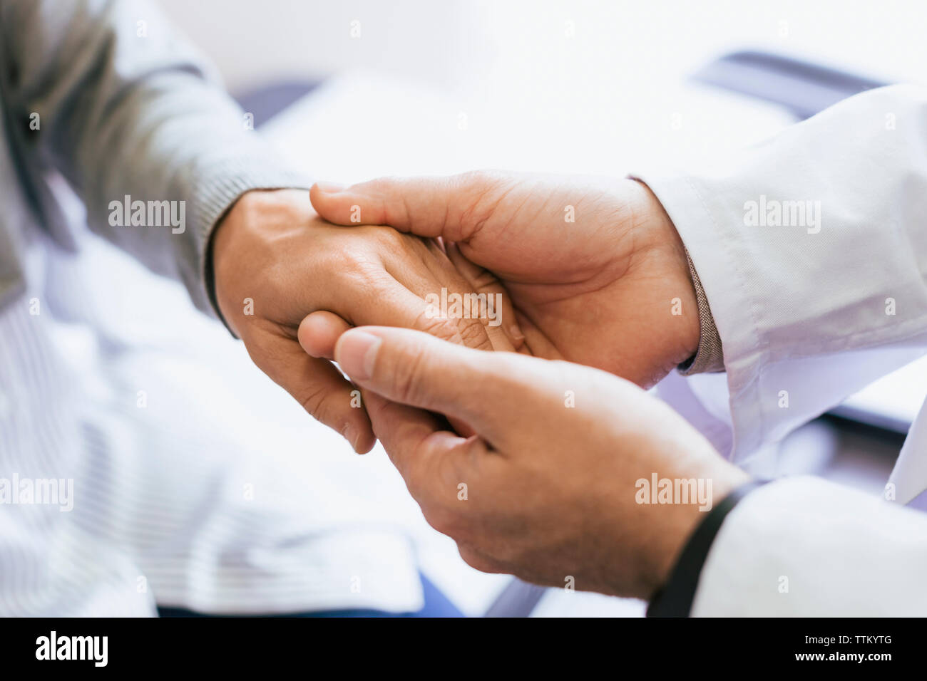 Close up female doctor consoling hi-res stock photography and images ...
