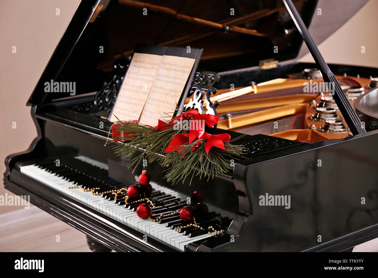 Christmas decoration on piano keys Stock Photo - Alamy