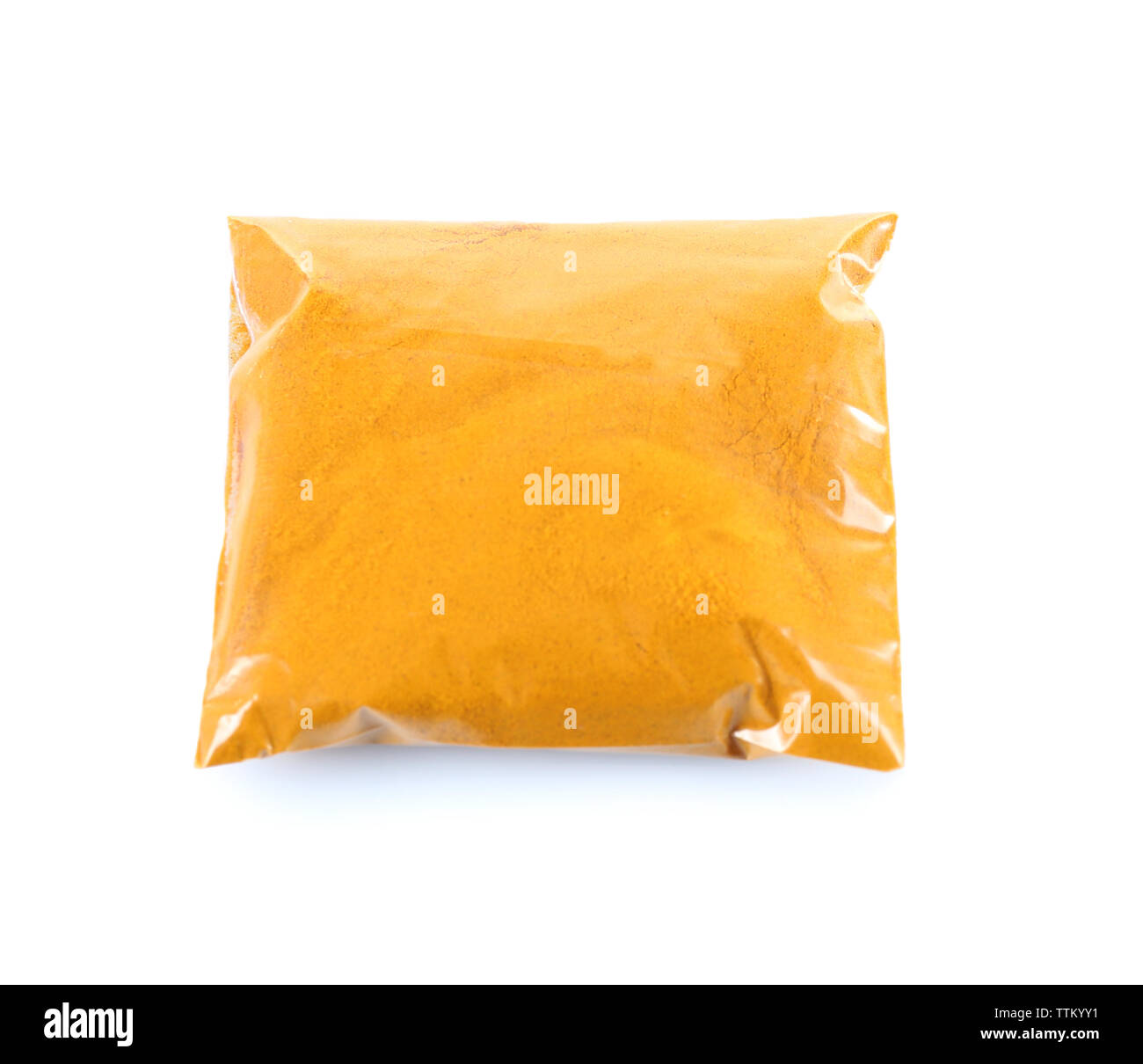 Powdered turmeric in plastic zipper bag, isolated on white Stock Photo ...
