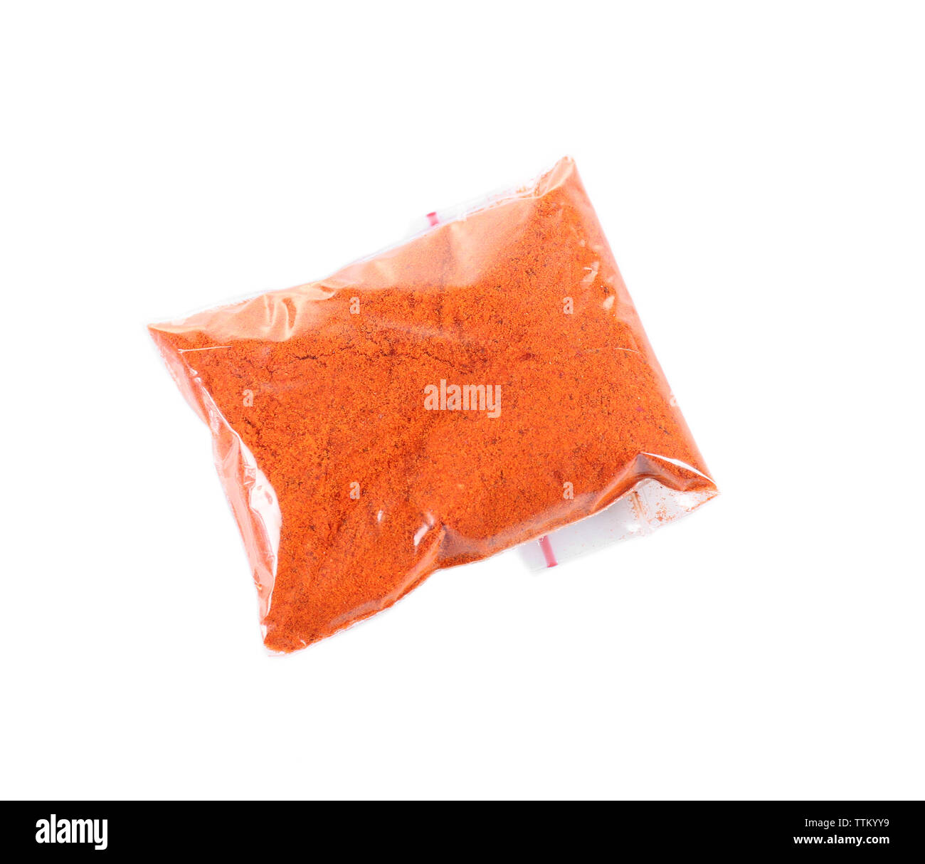 Powdered paprika in plastic zipper bag, isolated on white Stock Photo ...
