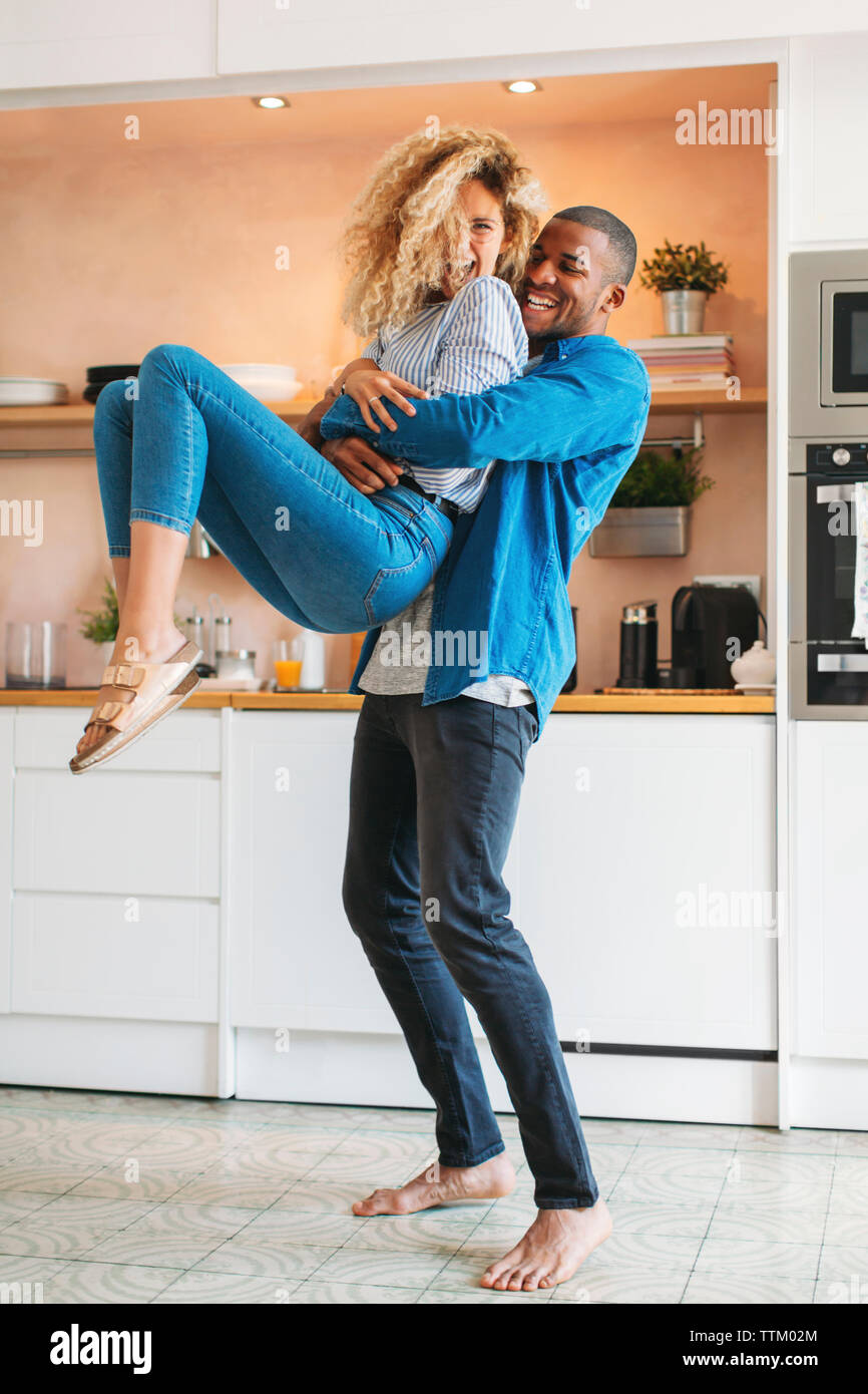Man carrying woman hi-res stock photography and images - Alamy