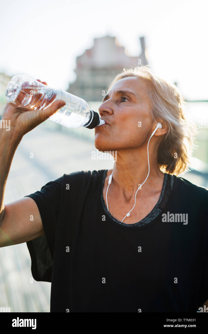50 years woman drinking water hi-res stock photography and images - Alamy
