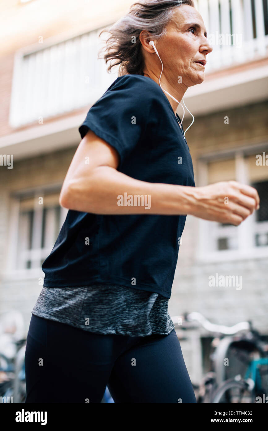 Woman jogging low angle hi-res stock photography and images - Alamy