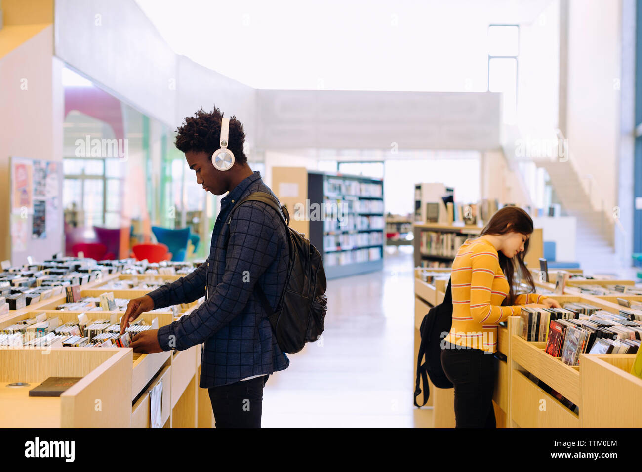 students choosing books in library Stock Photo - Alamy