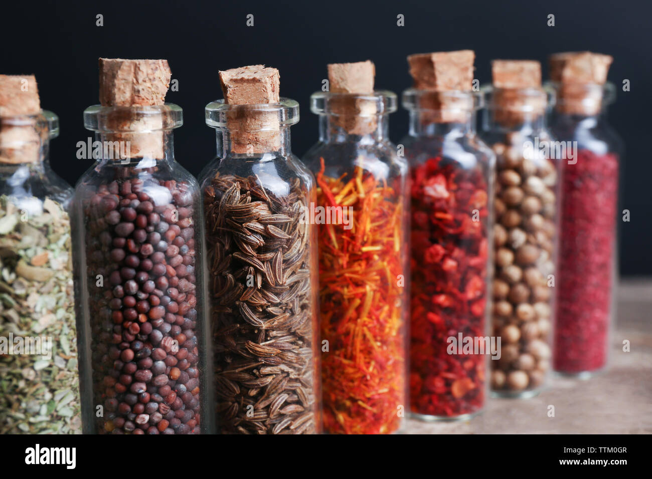Different spices in bottles hi-res stock photography and images - Alamy