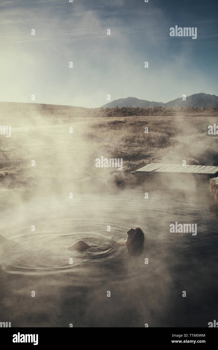 High angle view of woman swimming in Mammoth Lake Hot Springs Stock ...