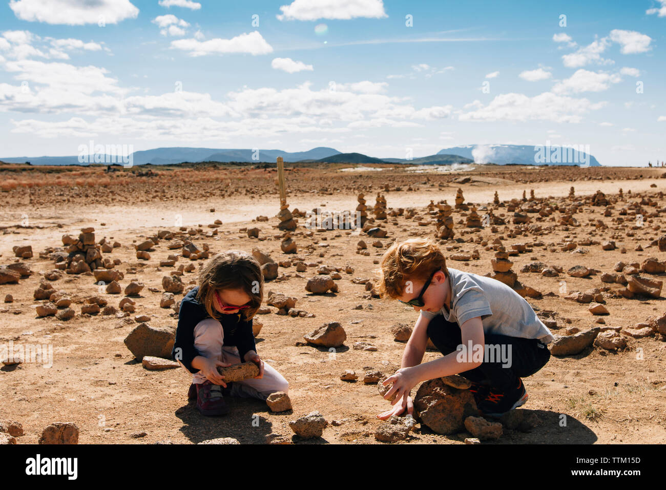 Girl playing the rocks hi-res stock photography and images - Alamy