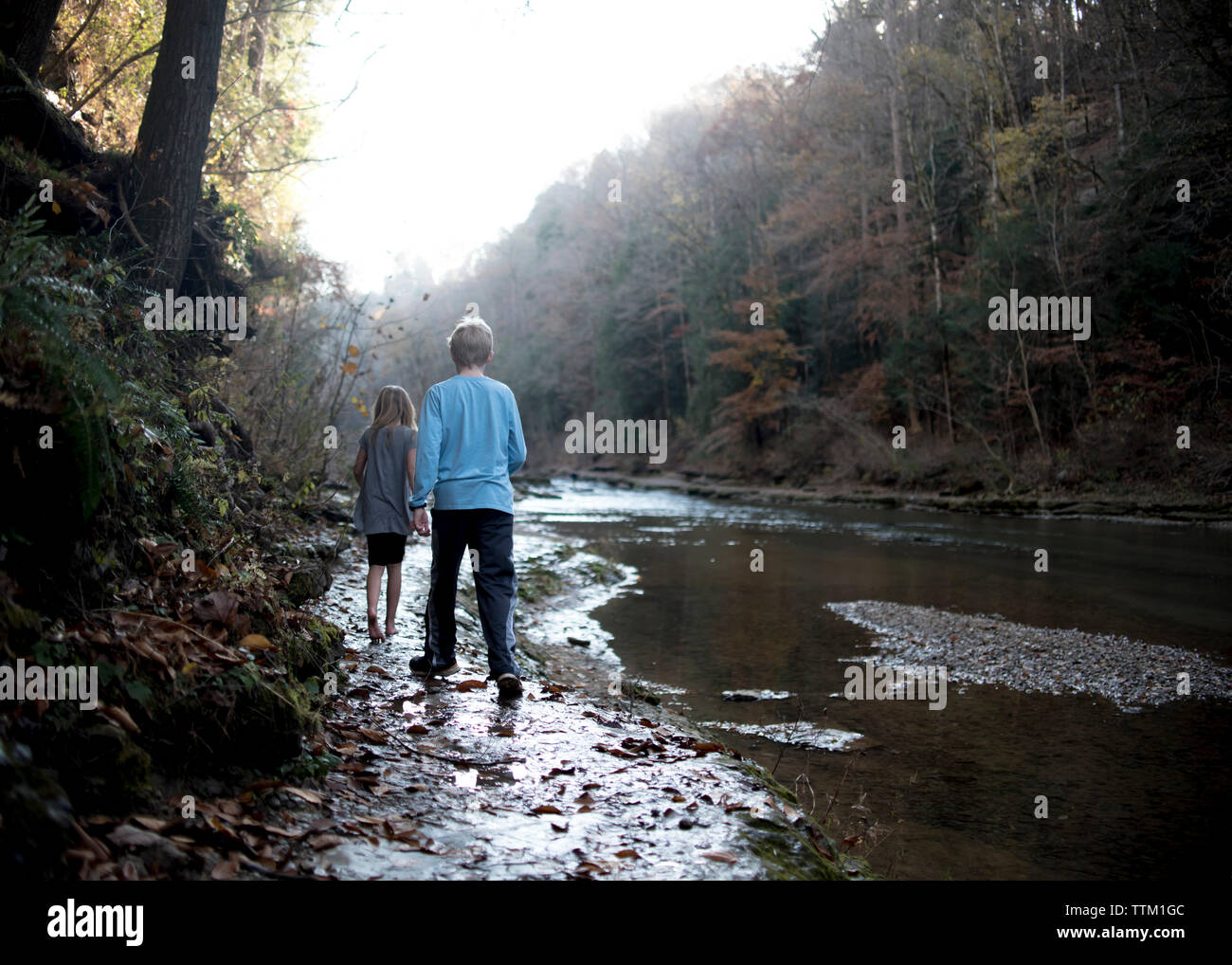 Siblings walking river hi-res stock photography and images - Alamy