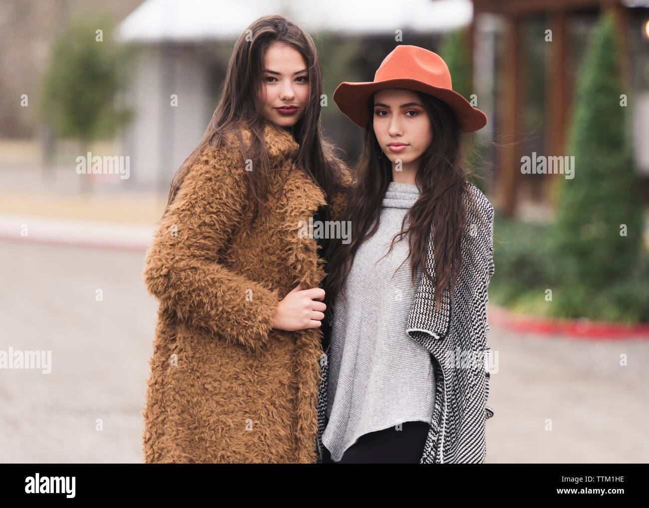 Friends standing in the street Stock Photo - Alamy