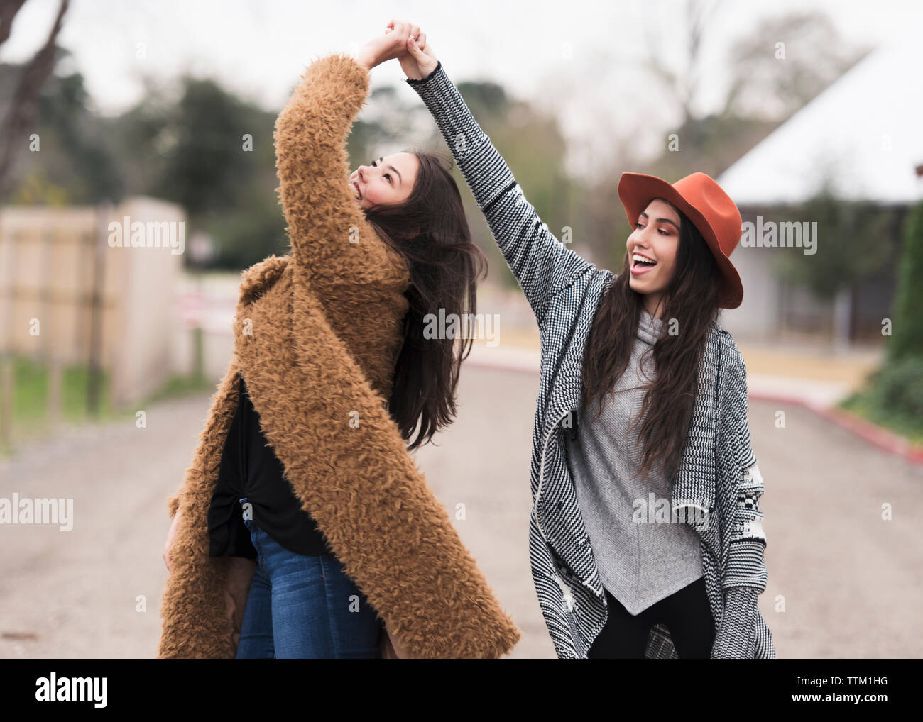 Smiling friends dancing on hi-res stock photography and images - Alamy