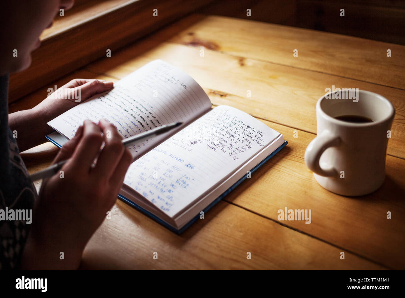 Table writing hi-res stock photography and images - Alamy