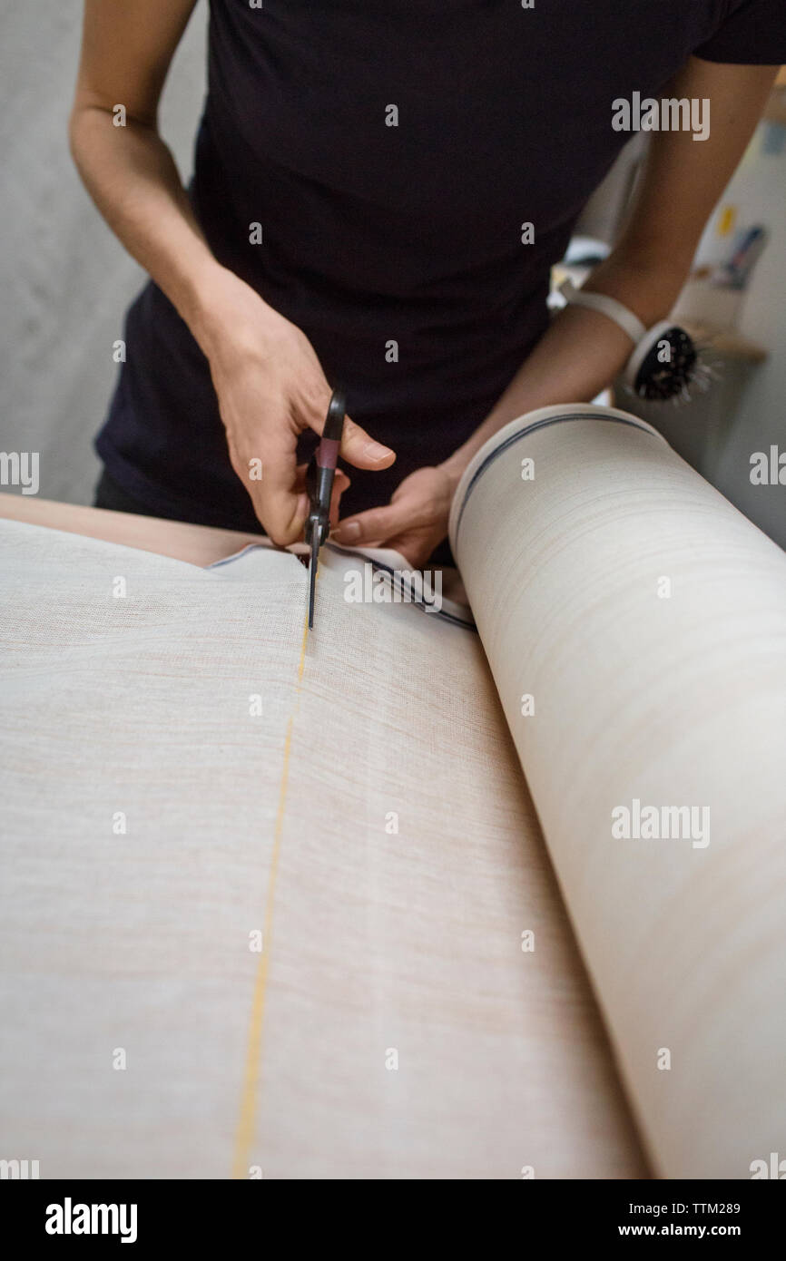 Cutting fabric hi-res stock photography and images - Alamy