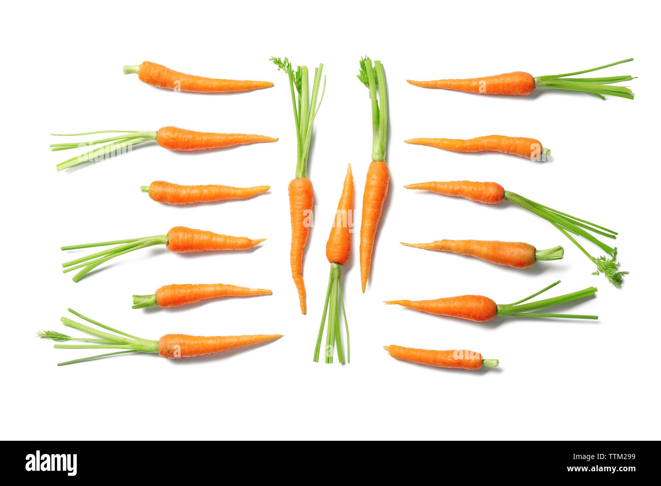 Carrots on white background Stock Photo - Alamy