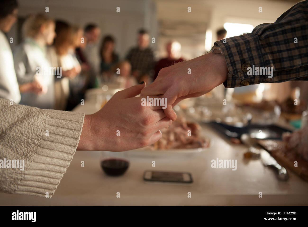 Family praying together hi-res stock photography and images - Alamy