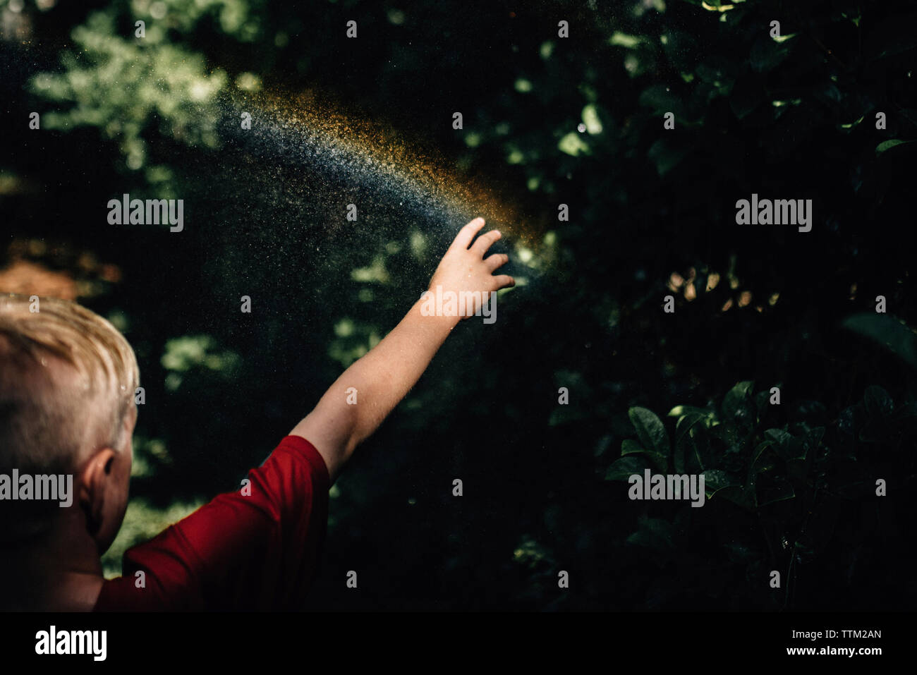 Child touching water hi-res stock photography and images - Alamy
