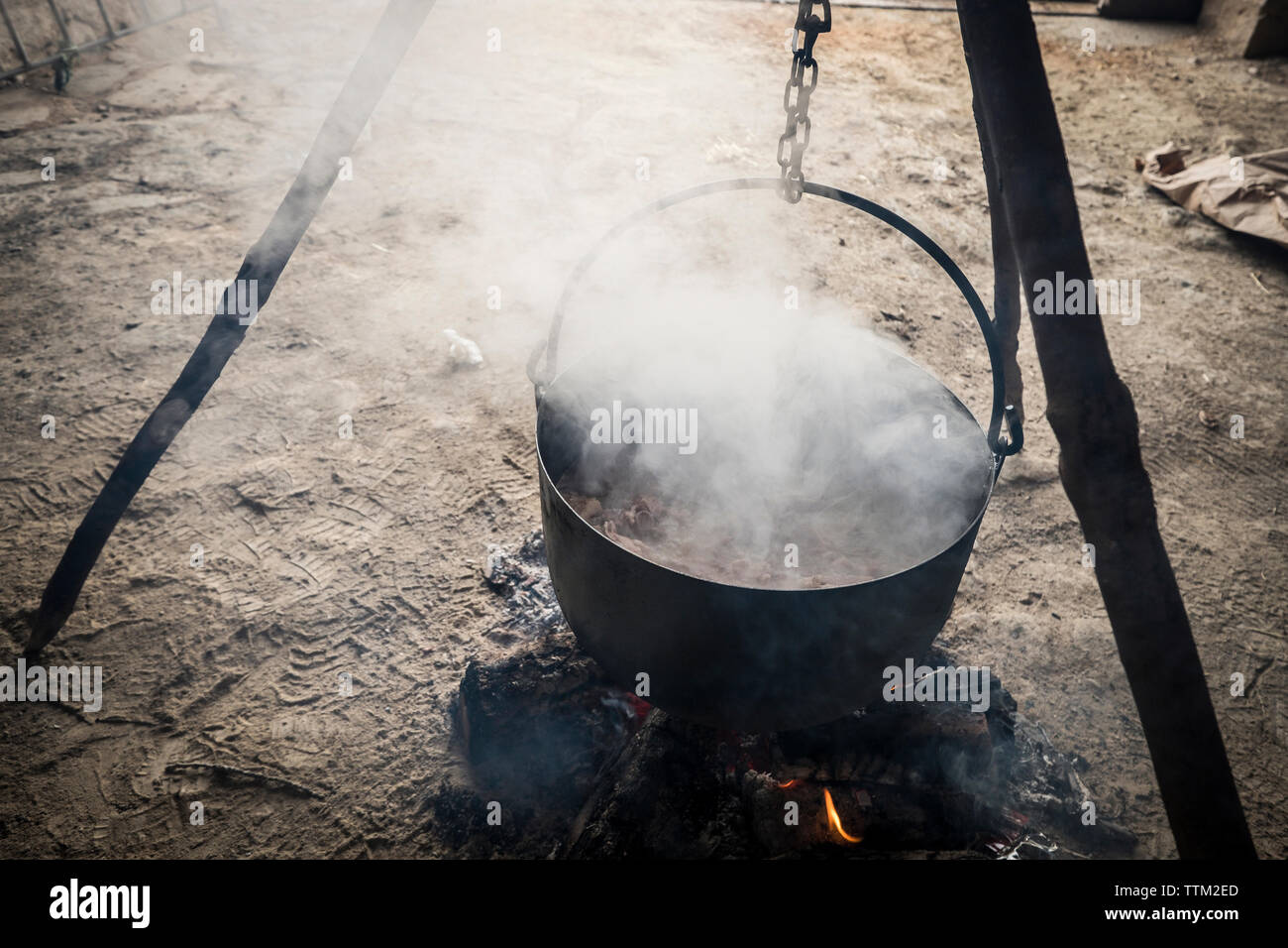High angle view of stew cooking in utensil at barn Stock Photo - Alamy