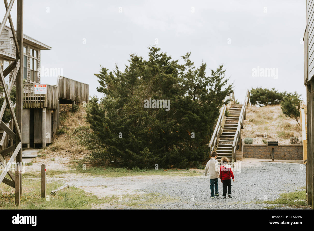 Brothers walking together hi-res stock photography and images - Alamy