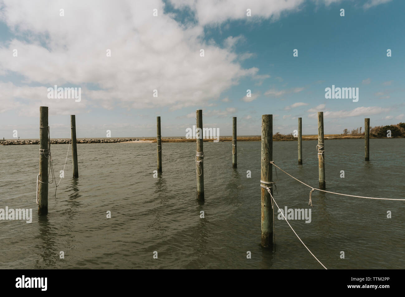 Wooden posts in sea hi-res stock photography and images - Alamy