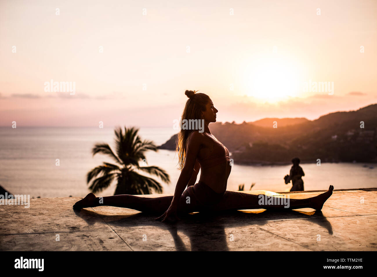 Sitting with legs apart hi-res stock photography and images - Alamy