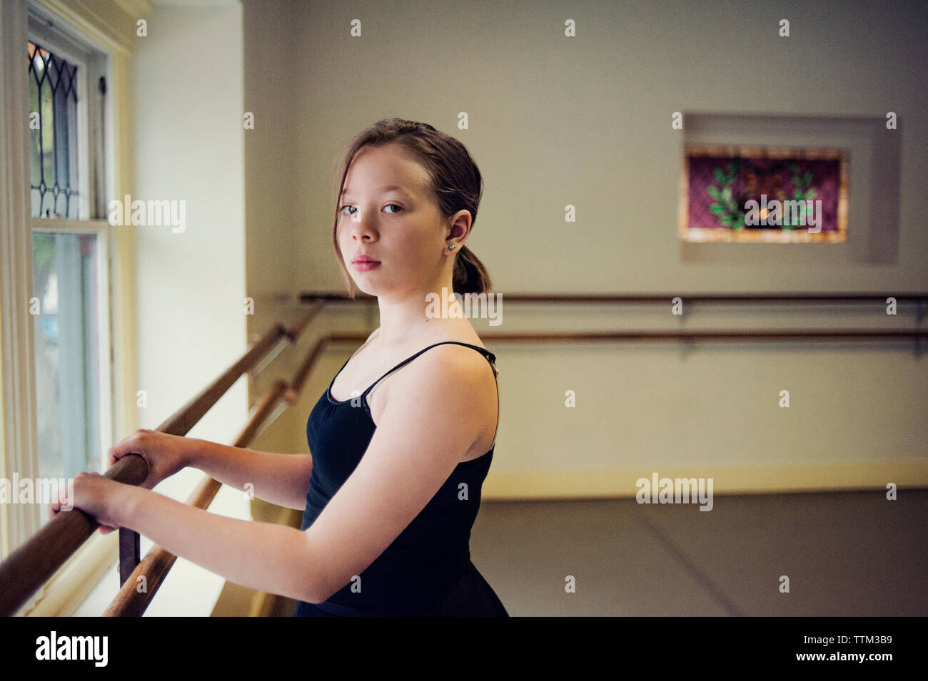 Portrait of ballet dancer standing at dance studio Stock Photo - Alamy
