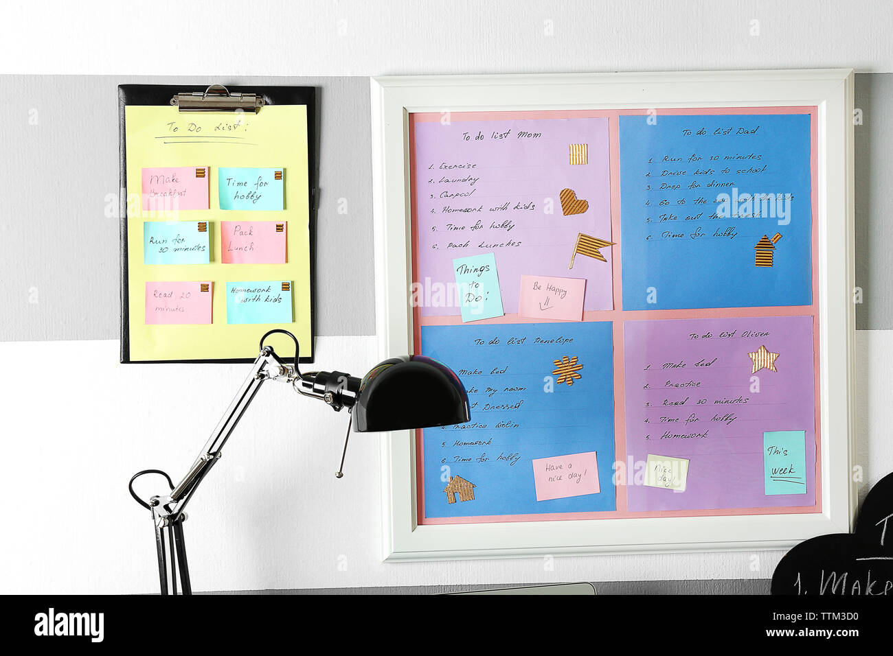 Family calendar on stylish wall. To do list concept Stock Photo - Alamy