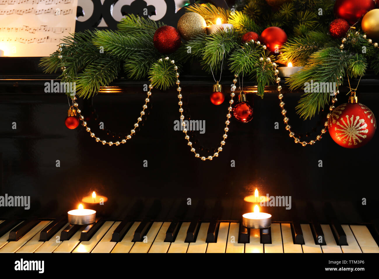 Piano keys with Christmas decorations, closeup Stock Photo - Alamy