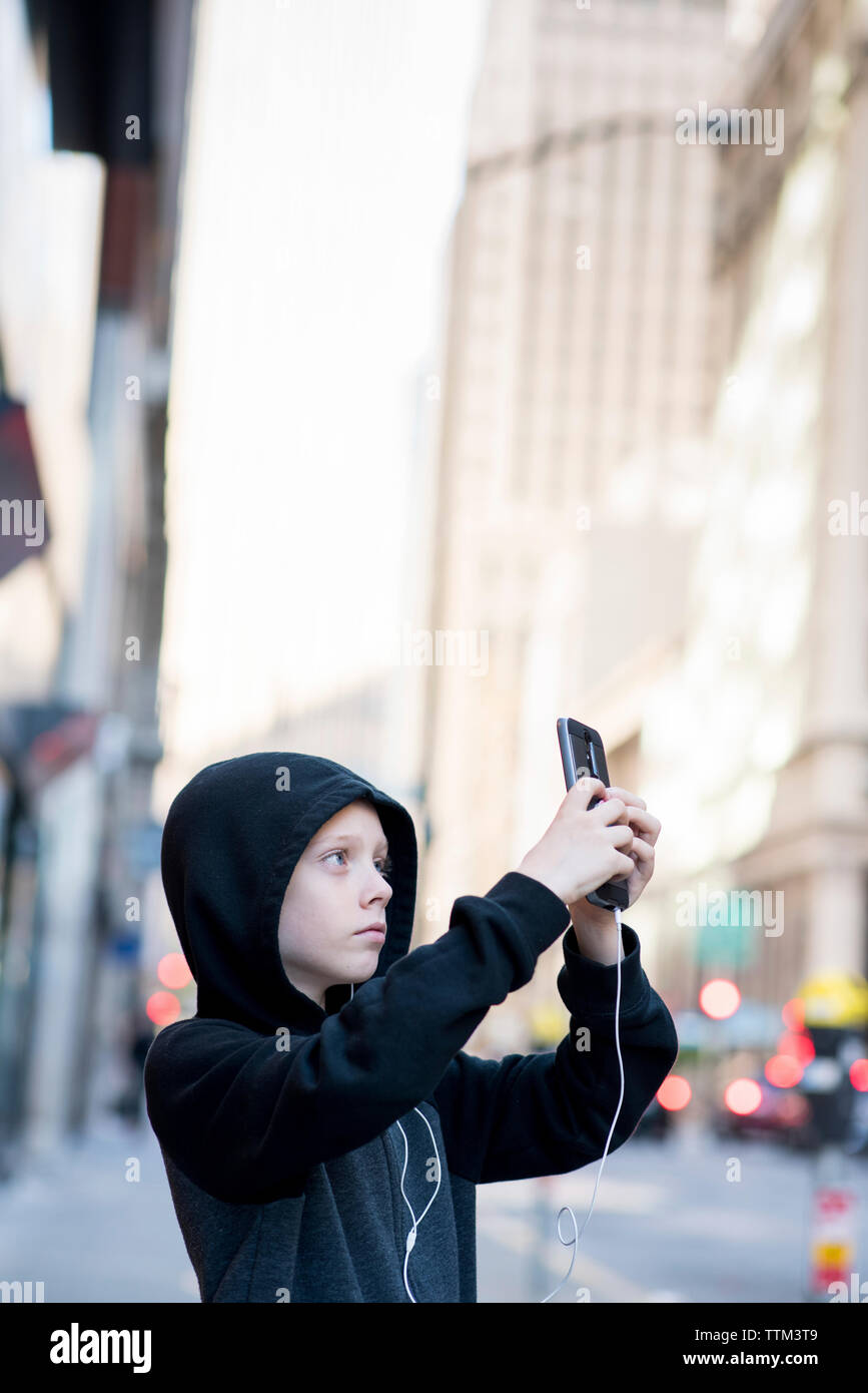Boy photographing with mobile hi-res stock photography and images - Alamy