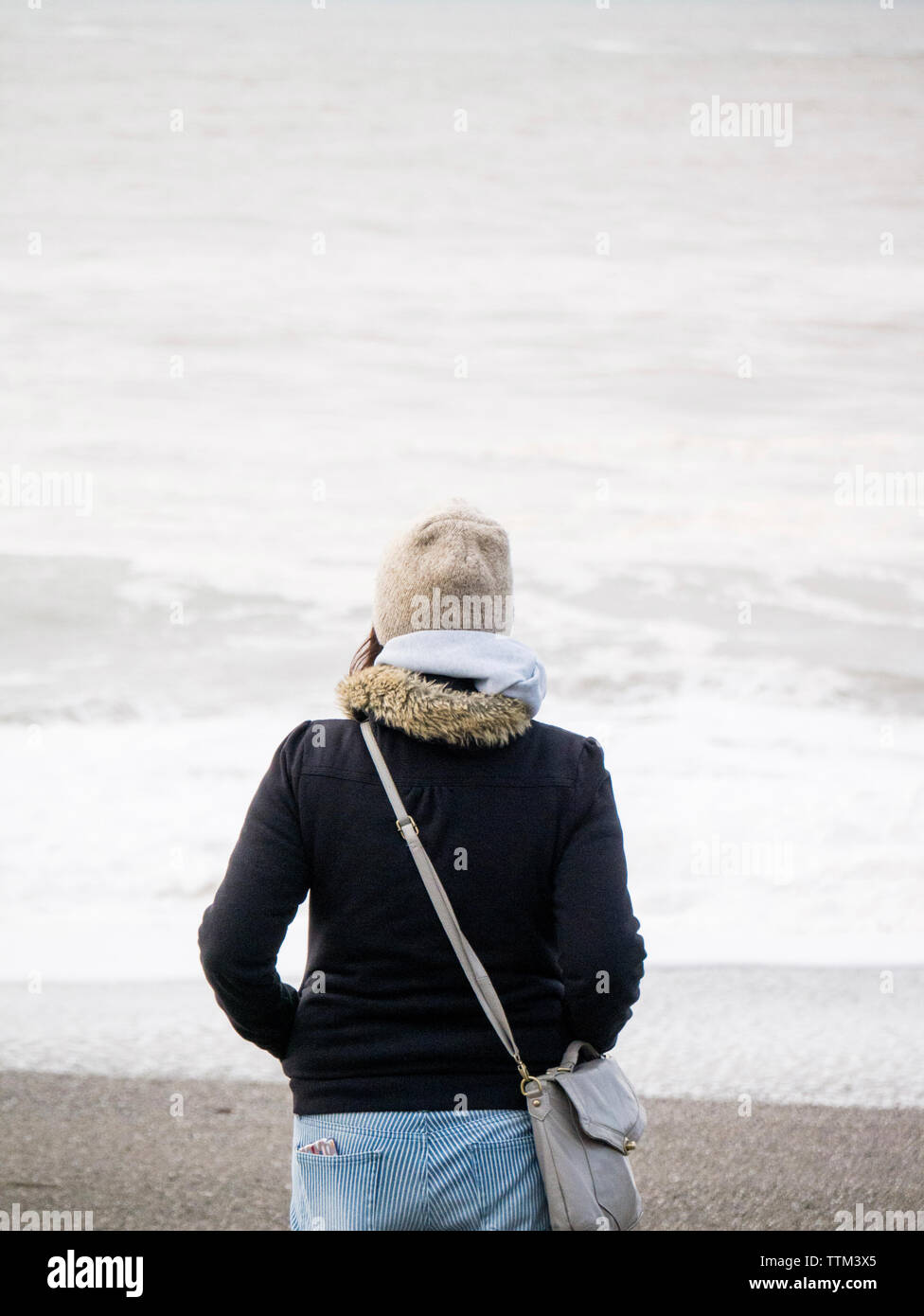 Rear view standing hi-res stock photography and images - Alamy