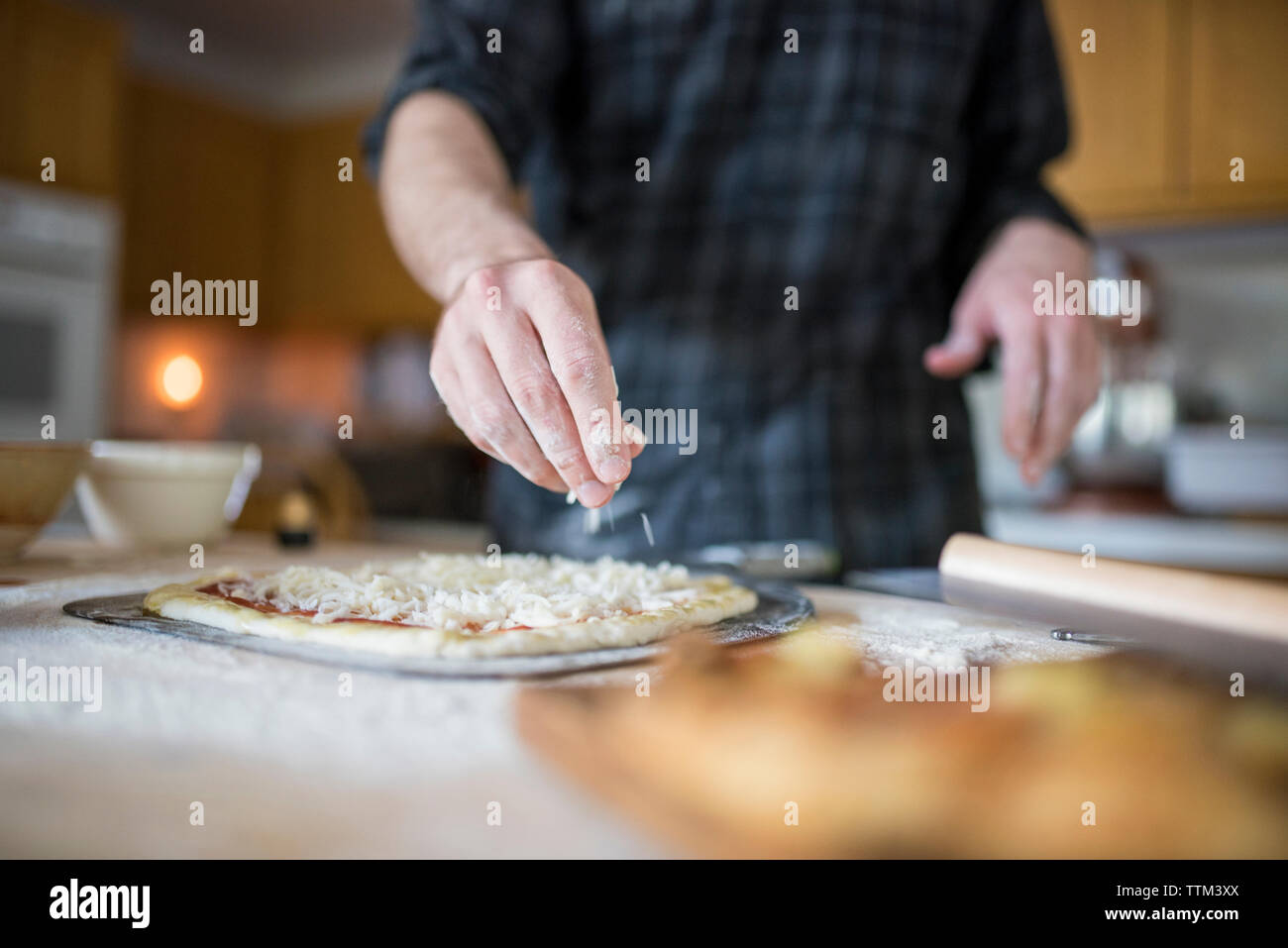 Sprinkling cheese hi-res stock photography and images - Alamy